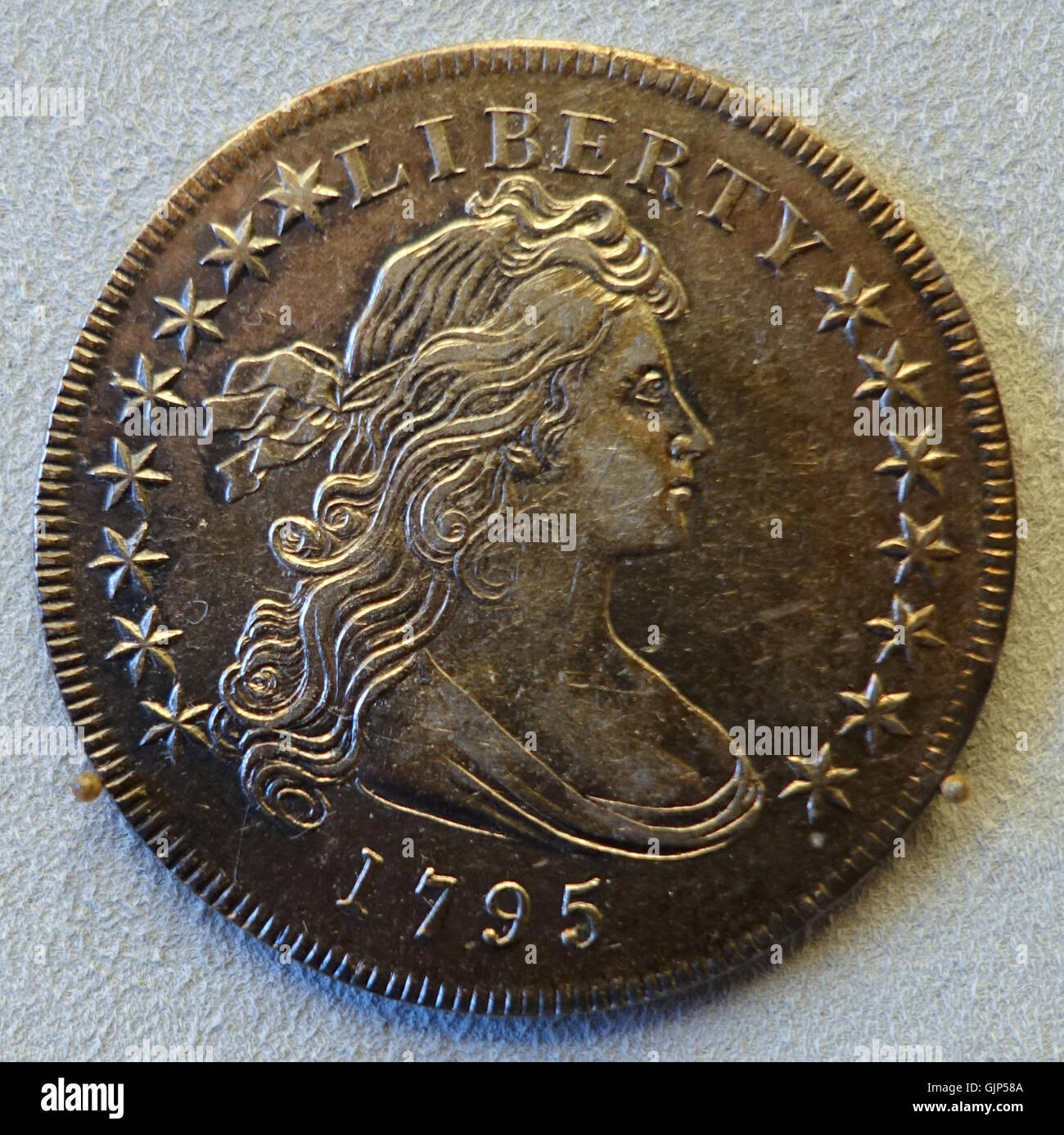 This 1795 U.S. dollar coin, on display at the Bode Museum, represents ...
