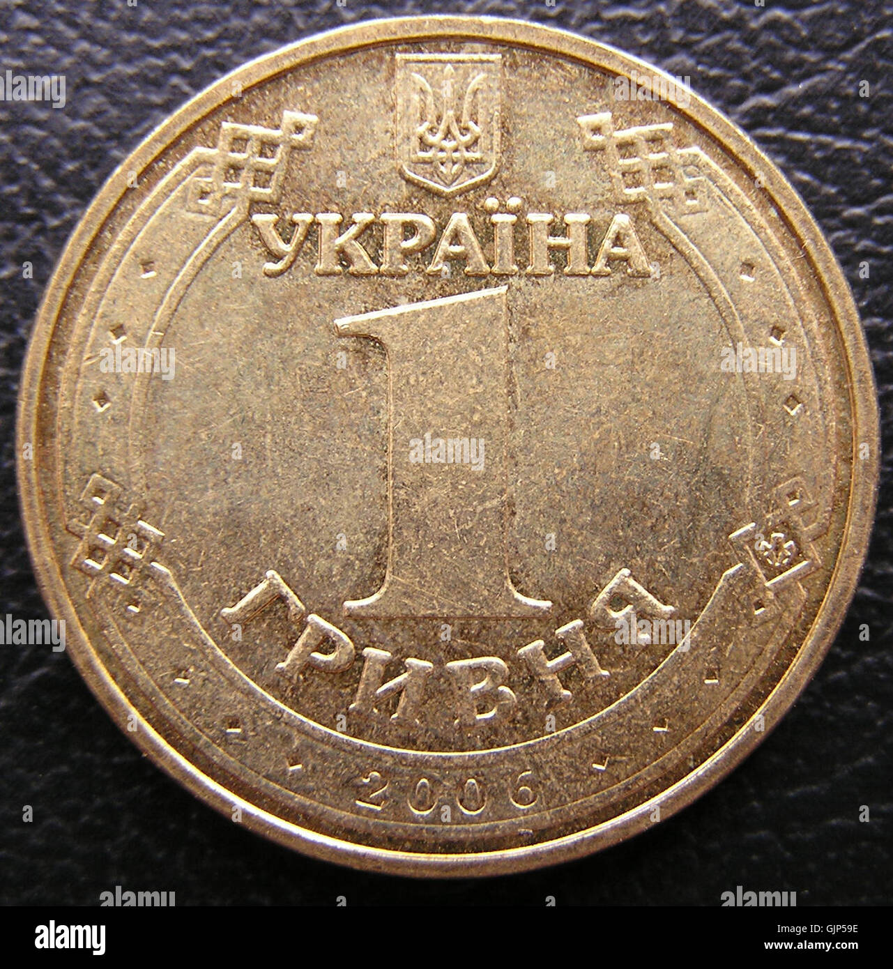 This item features a 1 Grivna coin from Ukraine, minted during the ...