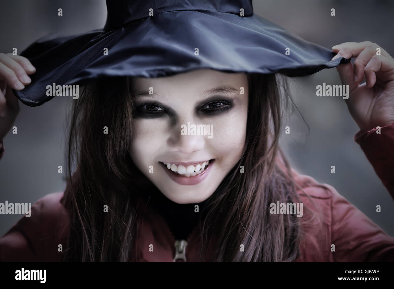 portrait of a little witch Stock Photo - Alamy