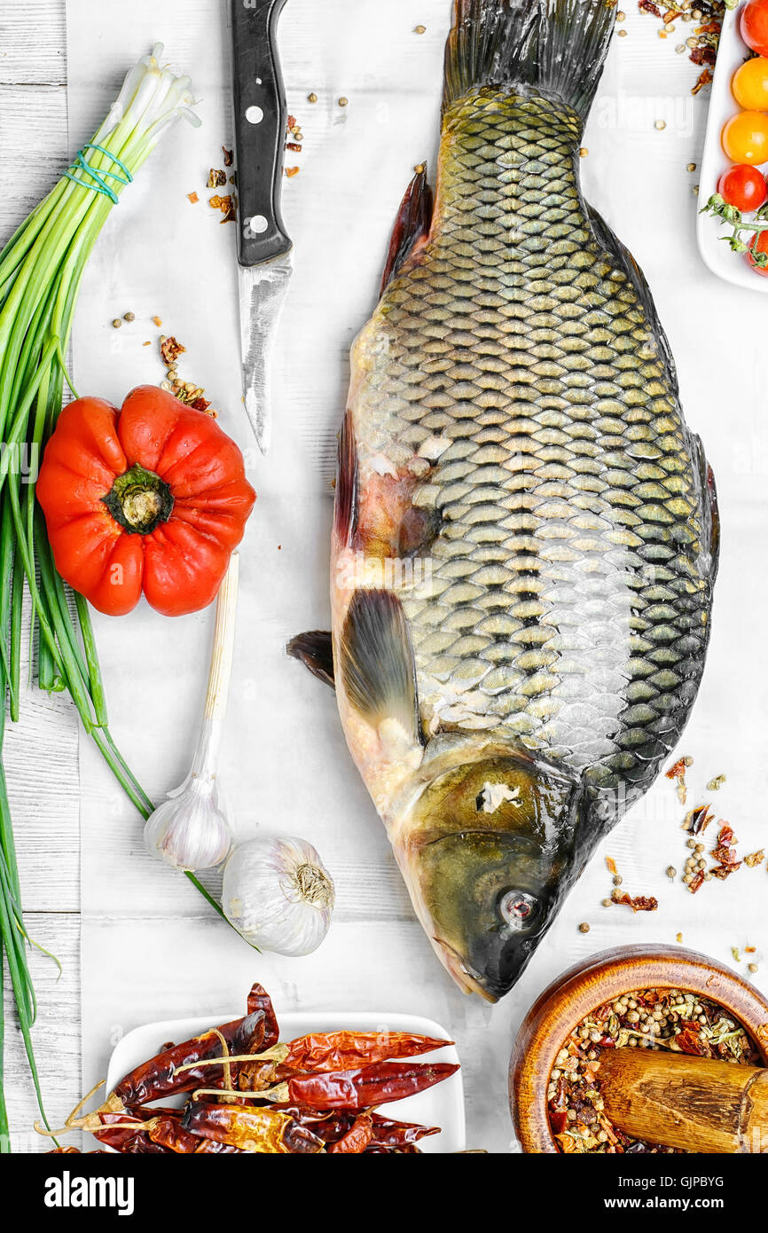 process of cooking processing of fish caught carp to bake Stock Photo ...