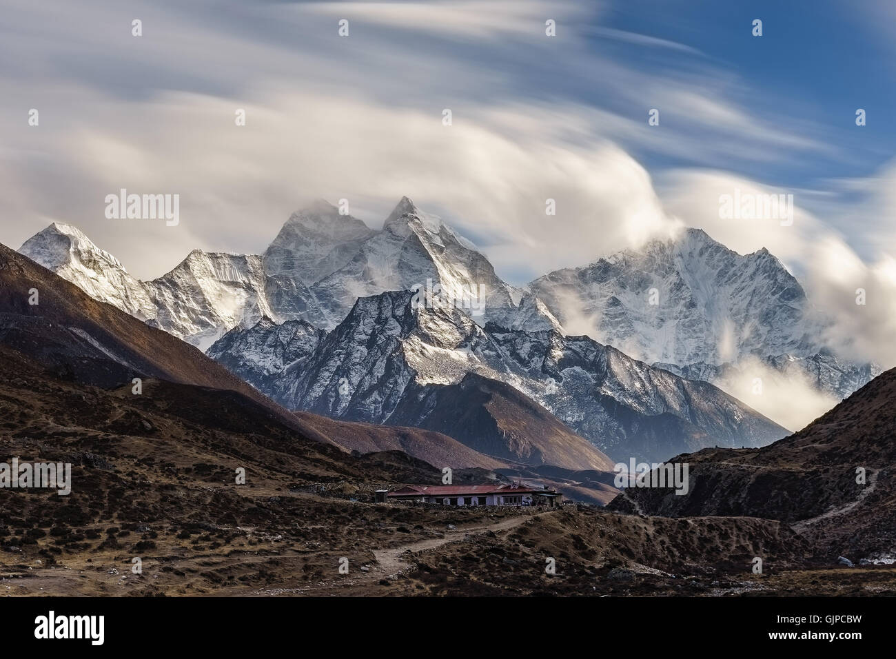 Cloudy movement over Himalayan mountain range landscape Stock Photo - Alamy