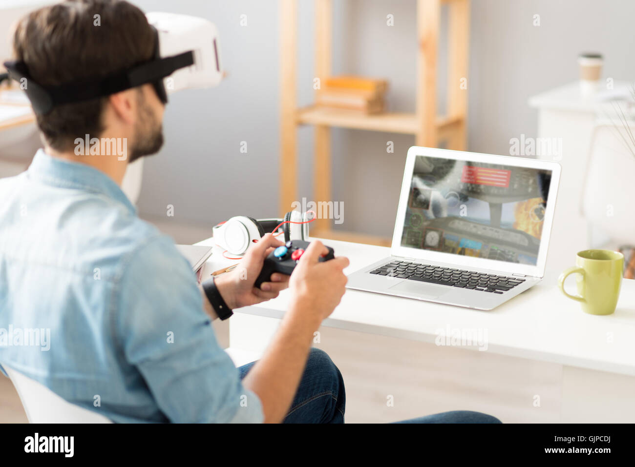 Person playing games tech hi-res stock photography and images - Alamy
