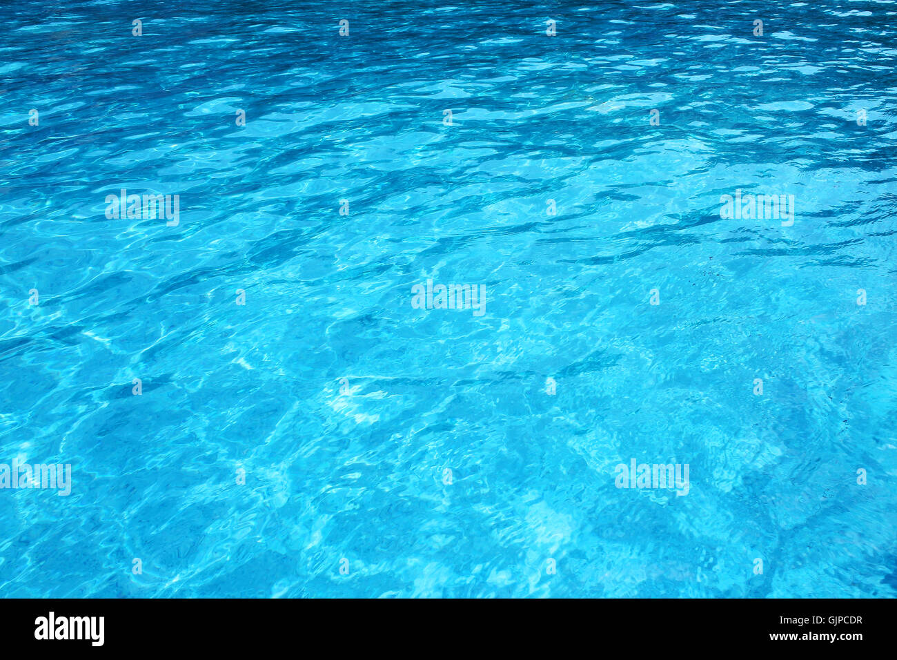 Swimming pool water background Stock Photo - Alamy