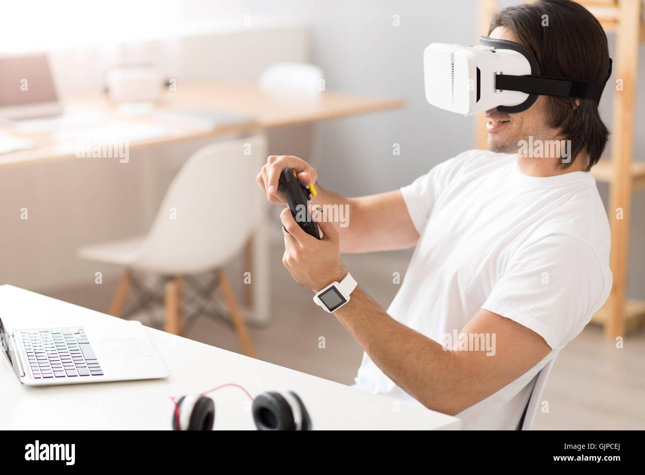 Console man hi-res stock photography and images - Alamy