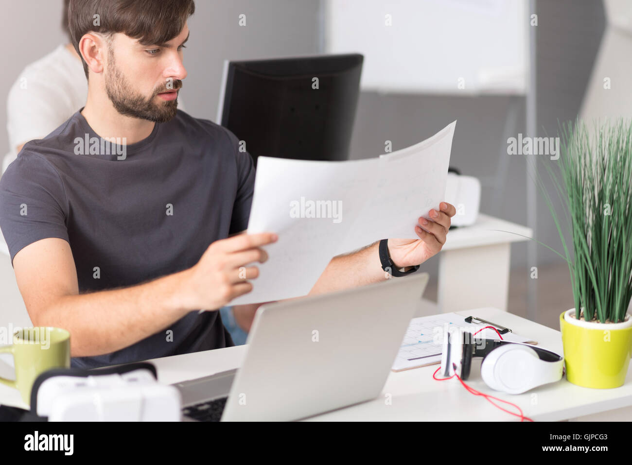 Working with papers hi-res stock photography and images - Alamy