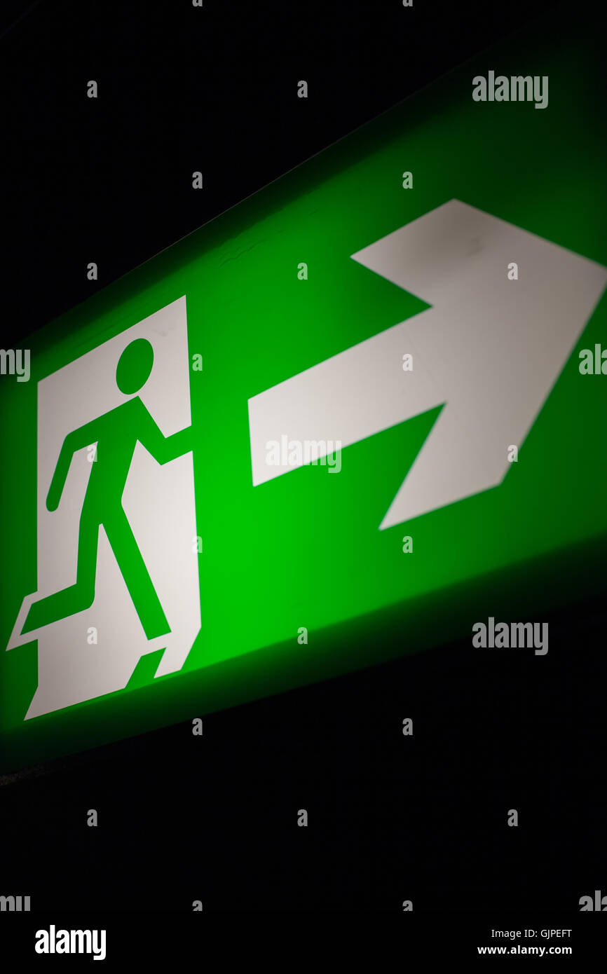 Close up shot of an emergency exit sign Stock Photo - Alamy