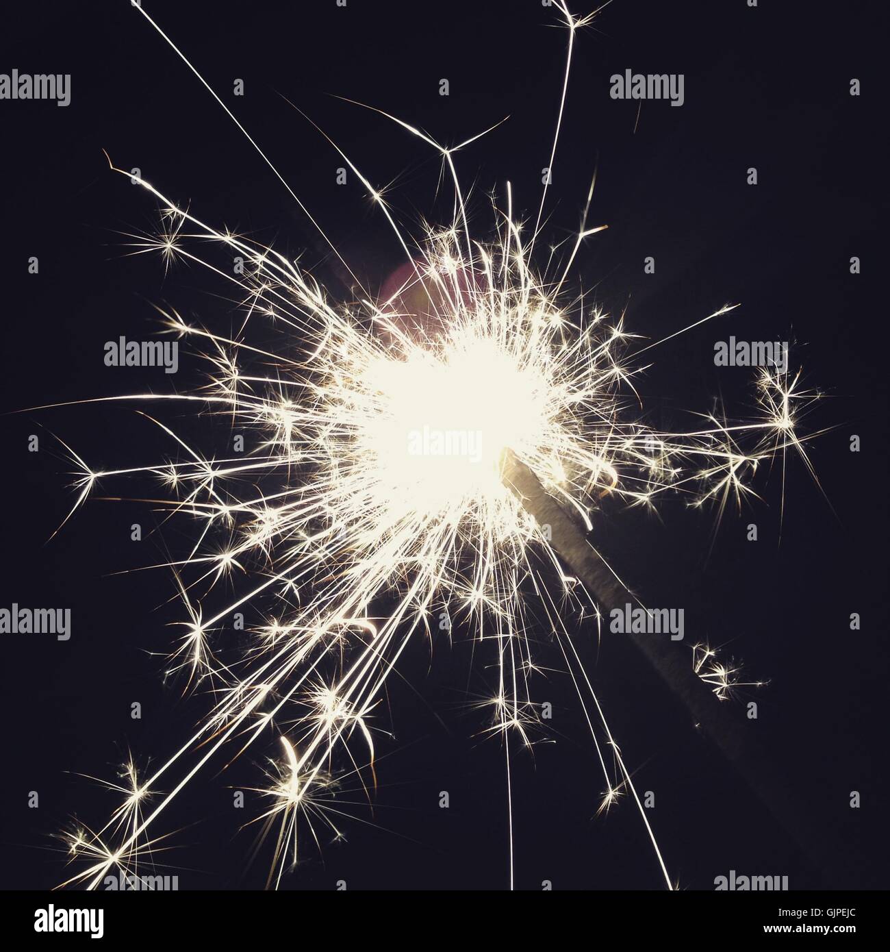 sparkler firework background fizzing sparks flying dazzling sparks on ...
