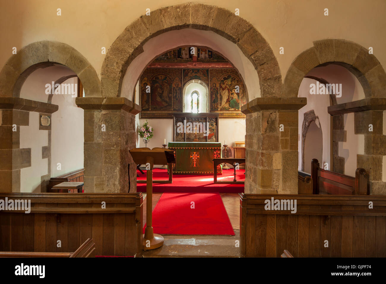 Interior of Norman church St Wulfran in Ovingdean, East Sussex, England ...