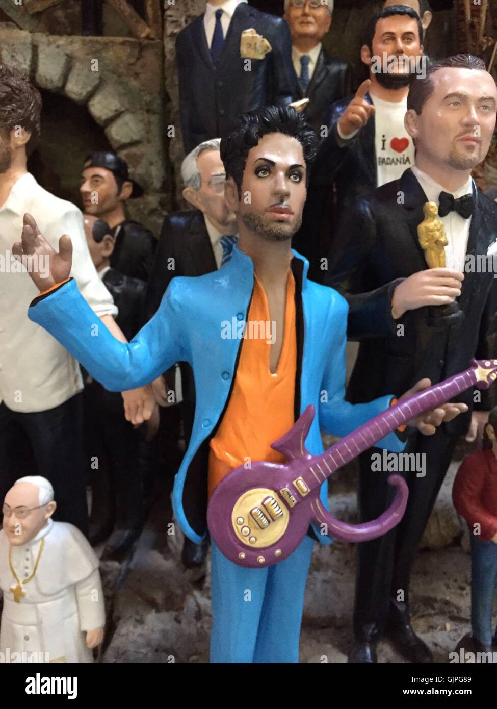 Marco Ferrigno with Prince statue he created Featuring: Marco Ferrigno ...