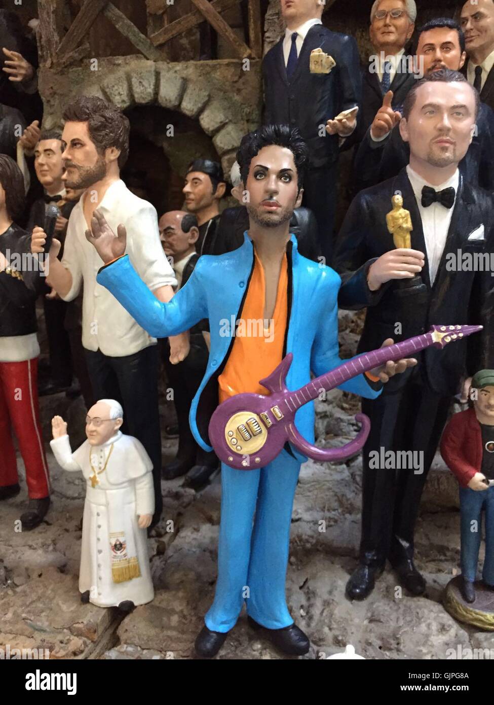 Marco Ferrigno with Prince statue he created Featuring: Marco Ferrigno ...