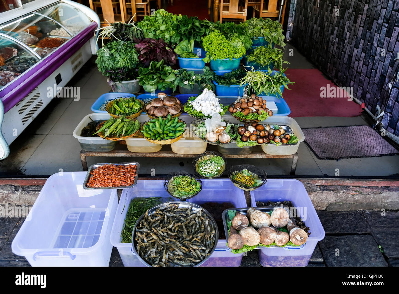 A fresh food display at a restaurant in Dali, Yunnan, China Stock Photo ...