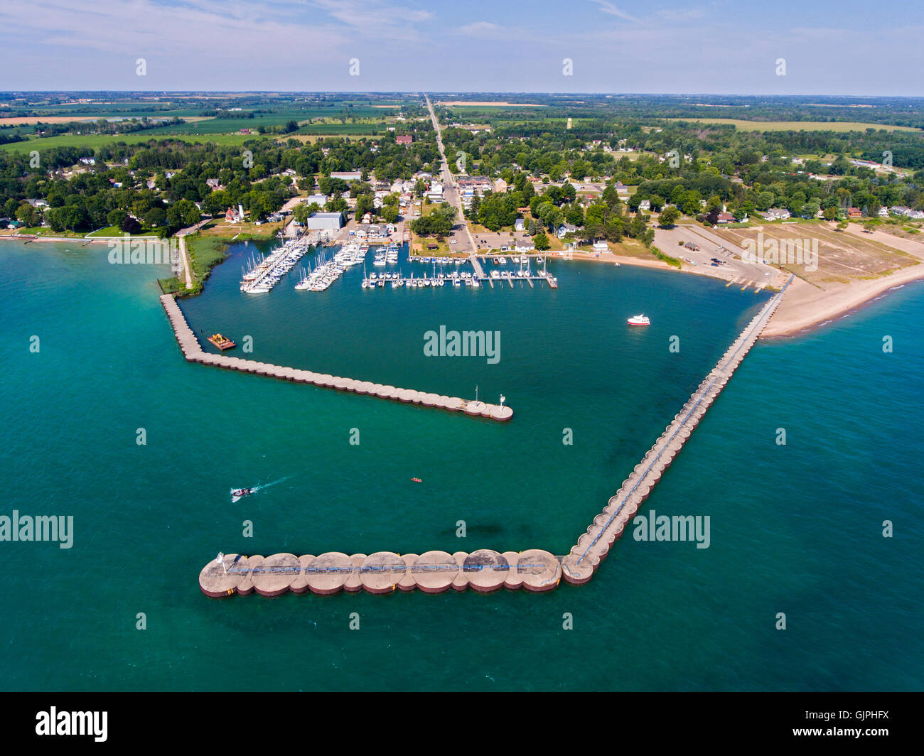Aerial view of a Small town man made harbor on Lake Huron at Port ...