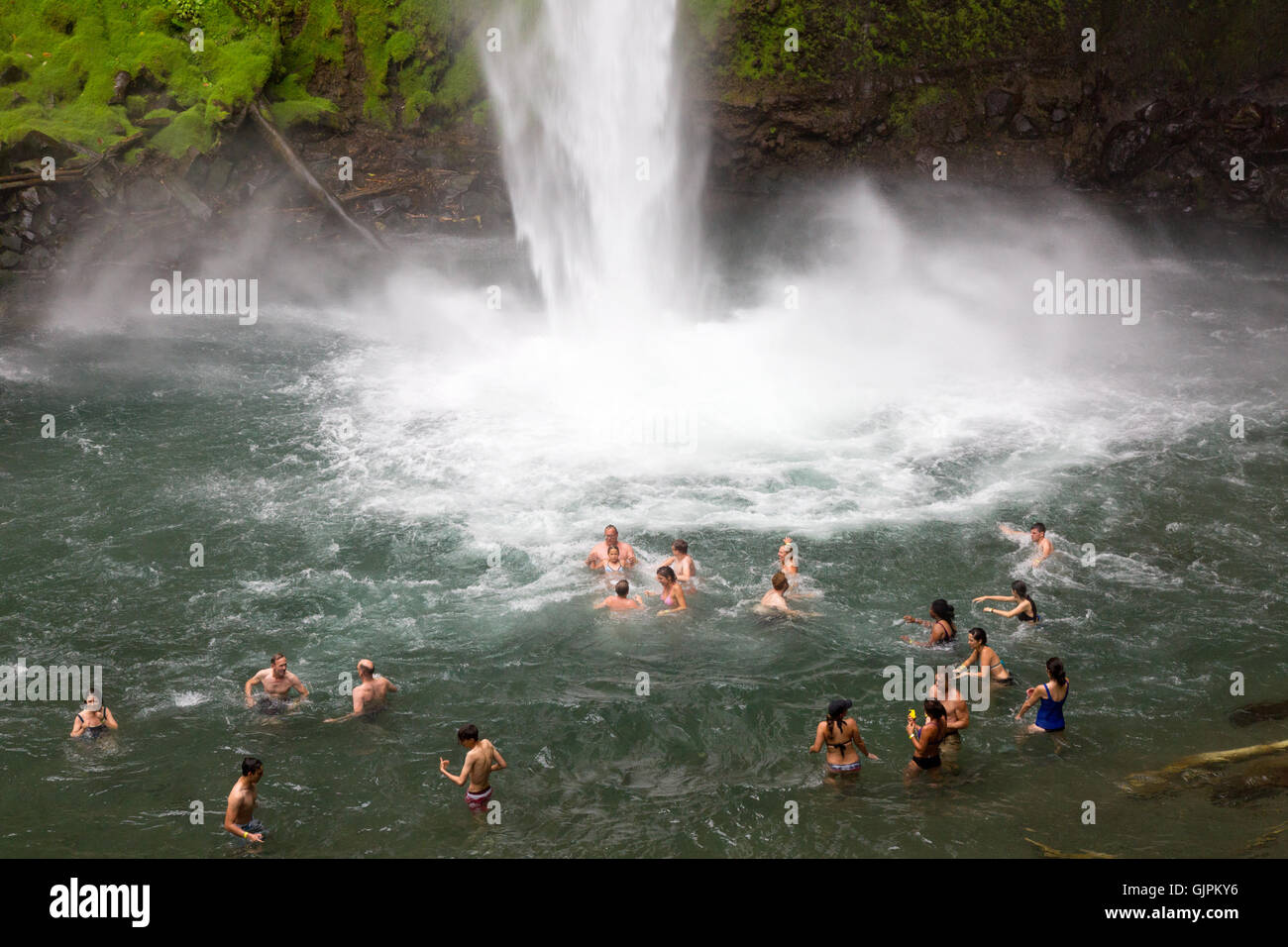 People swimming in the La Fortuna waterfall, Arenal, Costa Rica Central ...