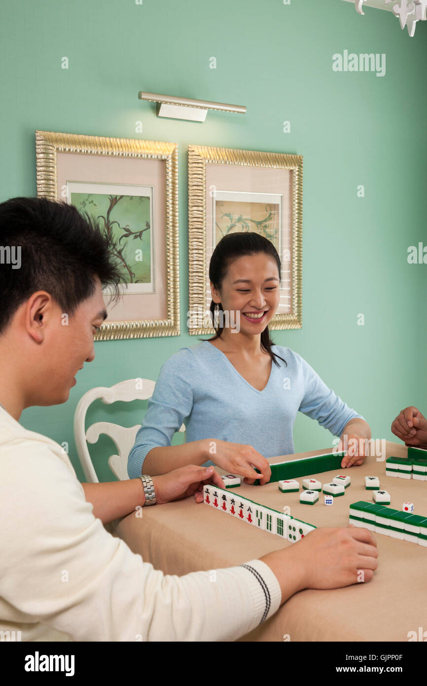 A people playing mahjong Stock Photo - Alamy