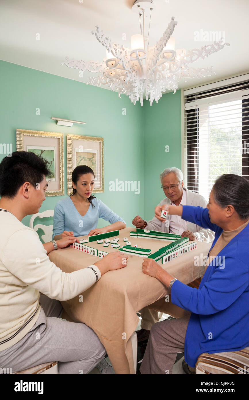 A people playing mahjong Stock Photo - Alamy