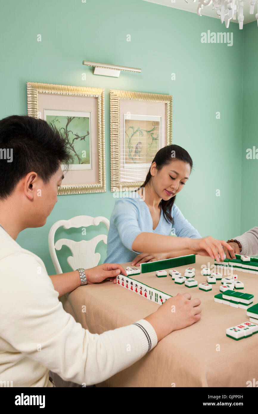 A people playing mahjong Stock Photo - Alamy