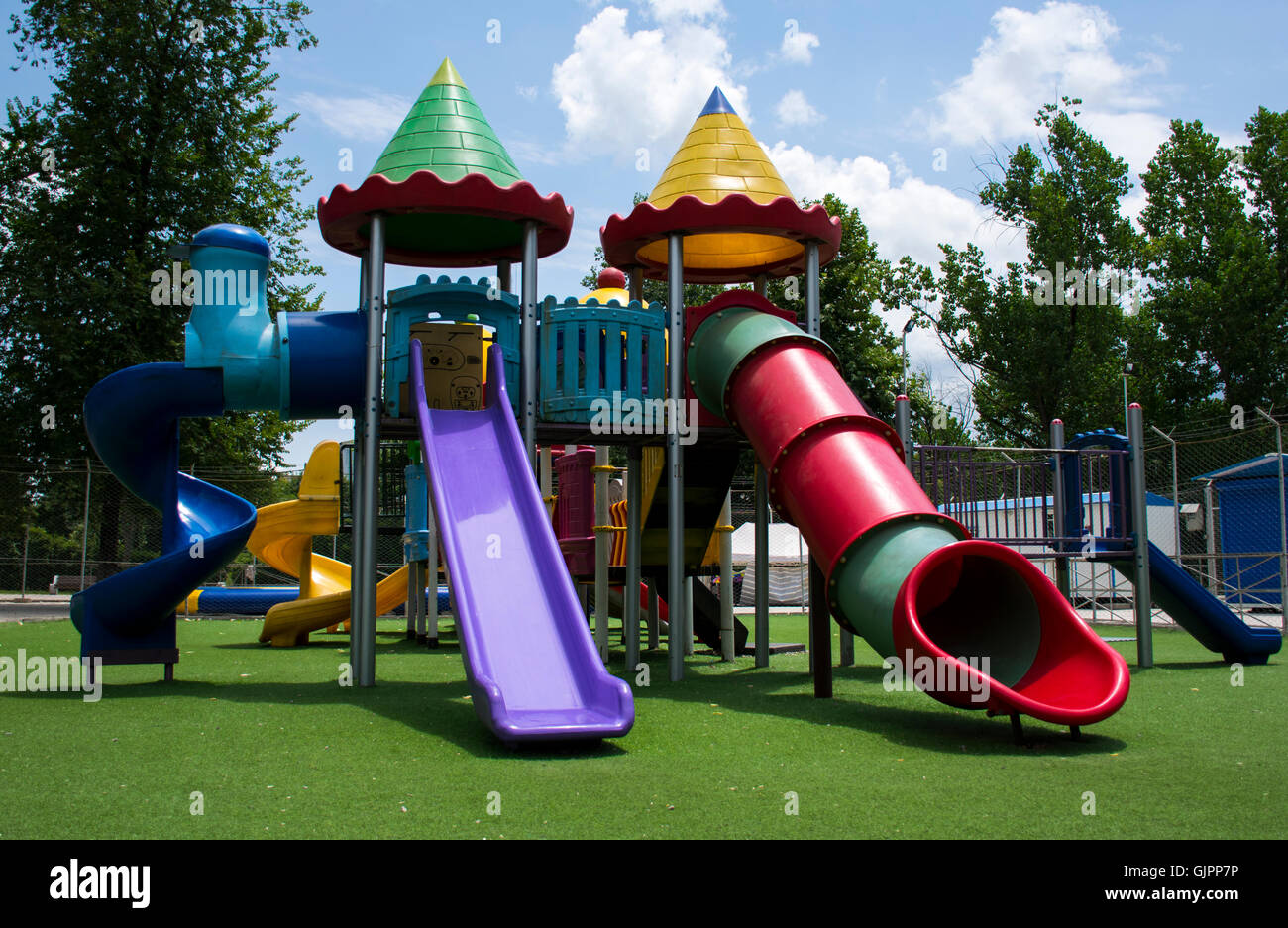 Playground in a park Stock Photo - Alamy