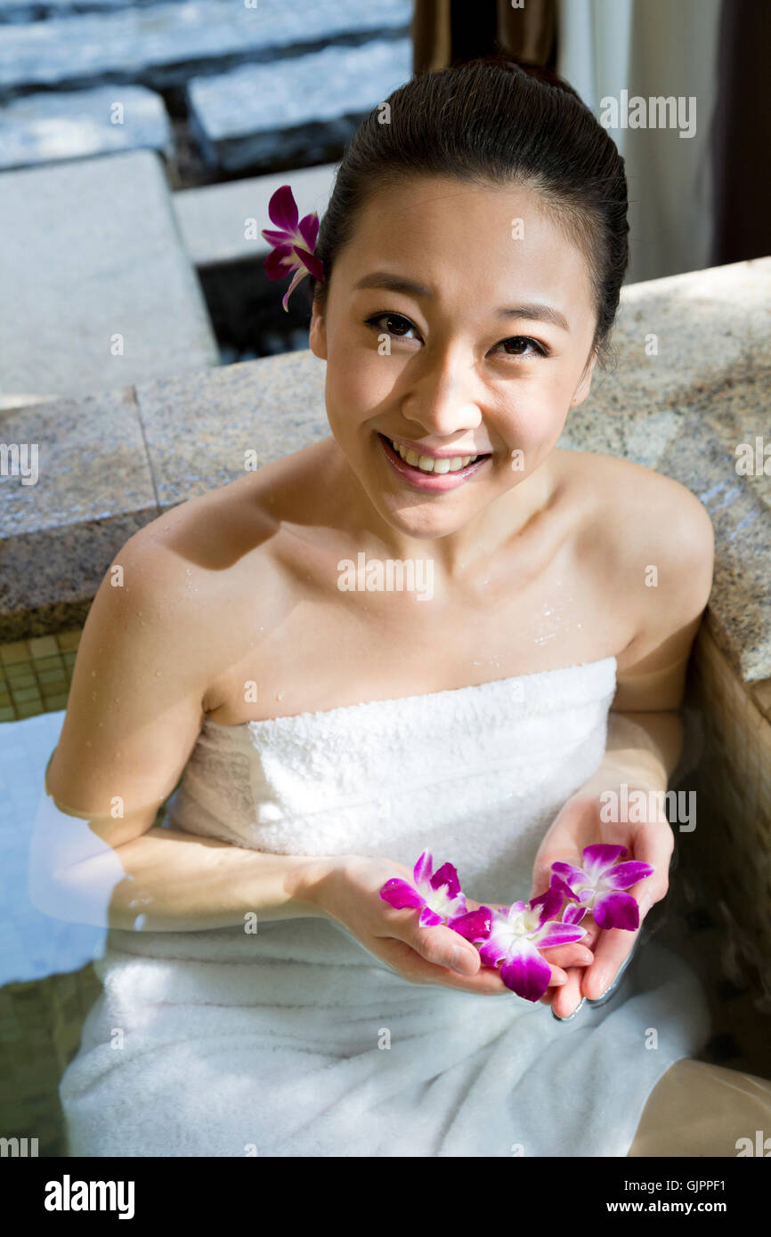 Young woman bathing Stock Photo - Alamy