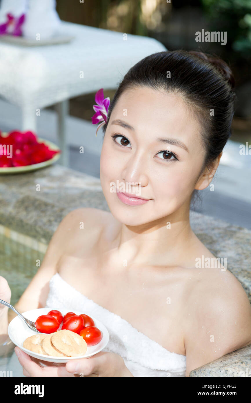 Young woman bathing Stock Photo - Alamy