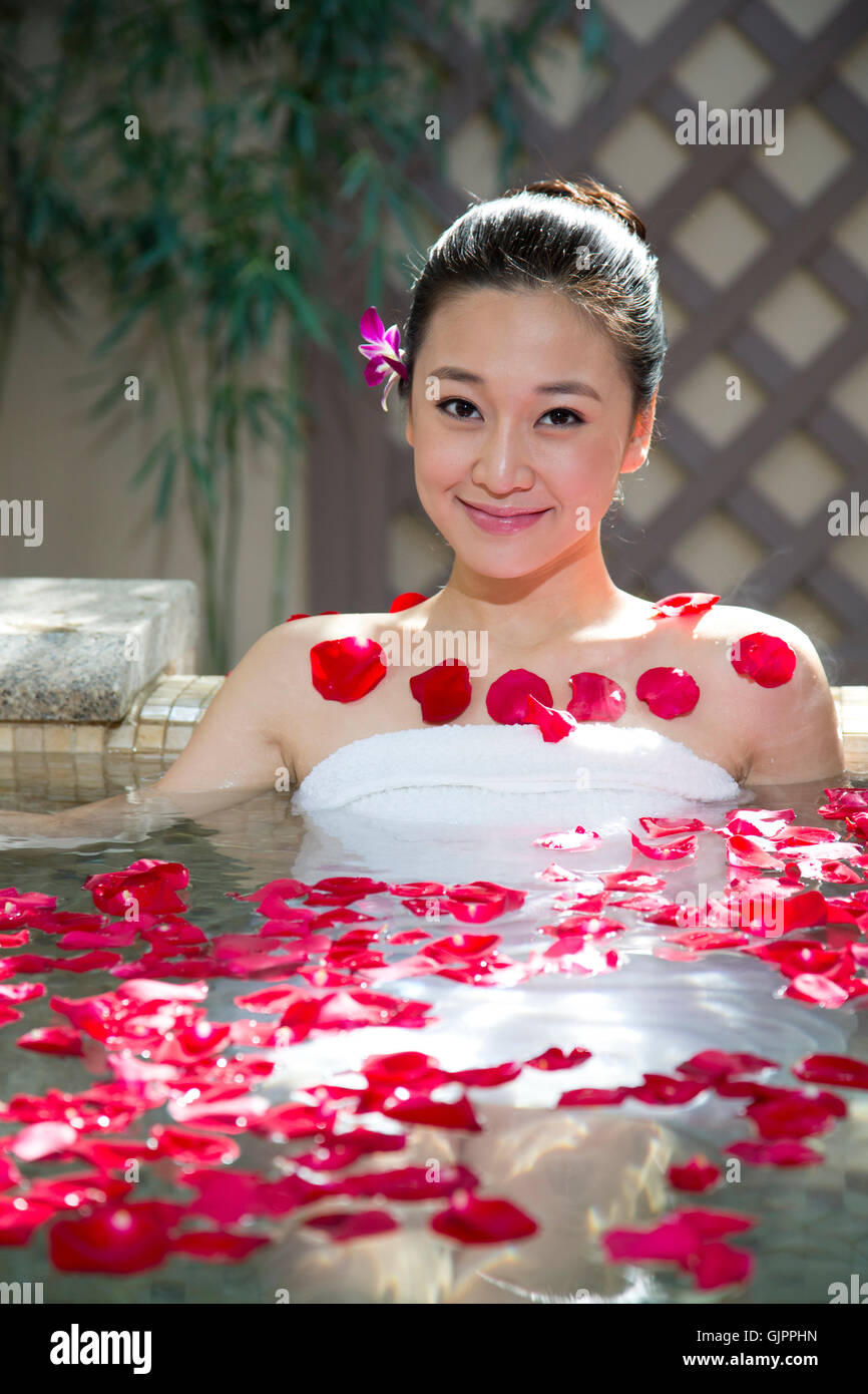 Young woman bathing Stock Photo - Alamy