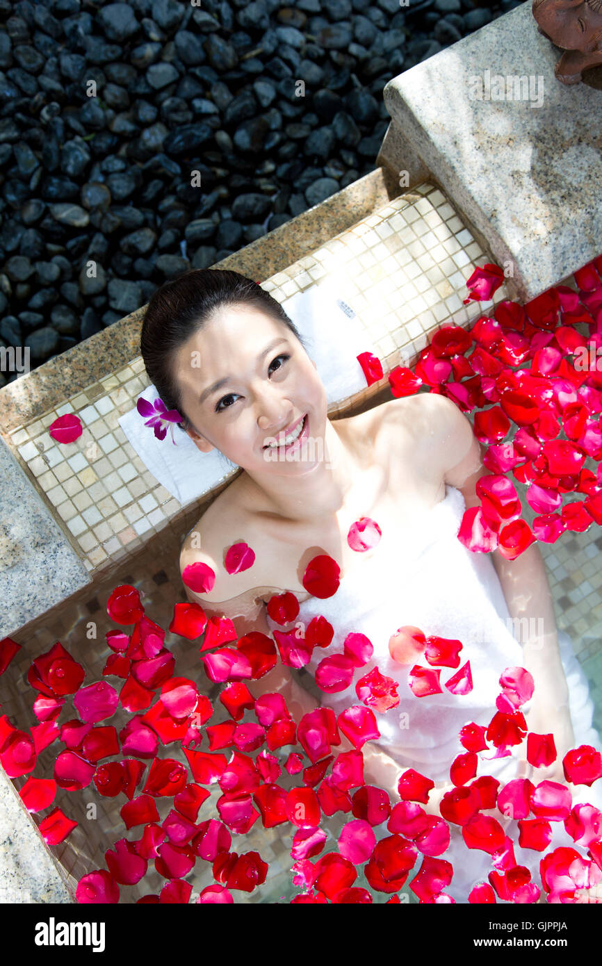 Young woman bathing Stock Photo - Alamy