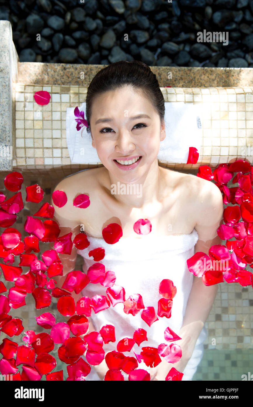 Young woman bathing Stock Photo - Alamy