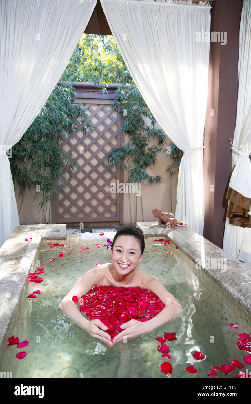Young woman bathing Stock Photo - Alamy