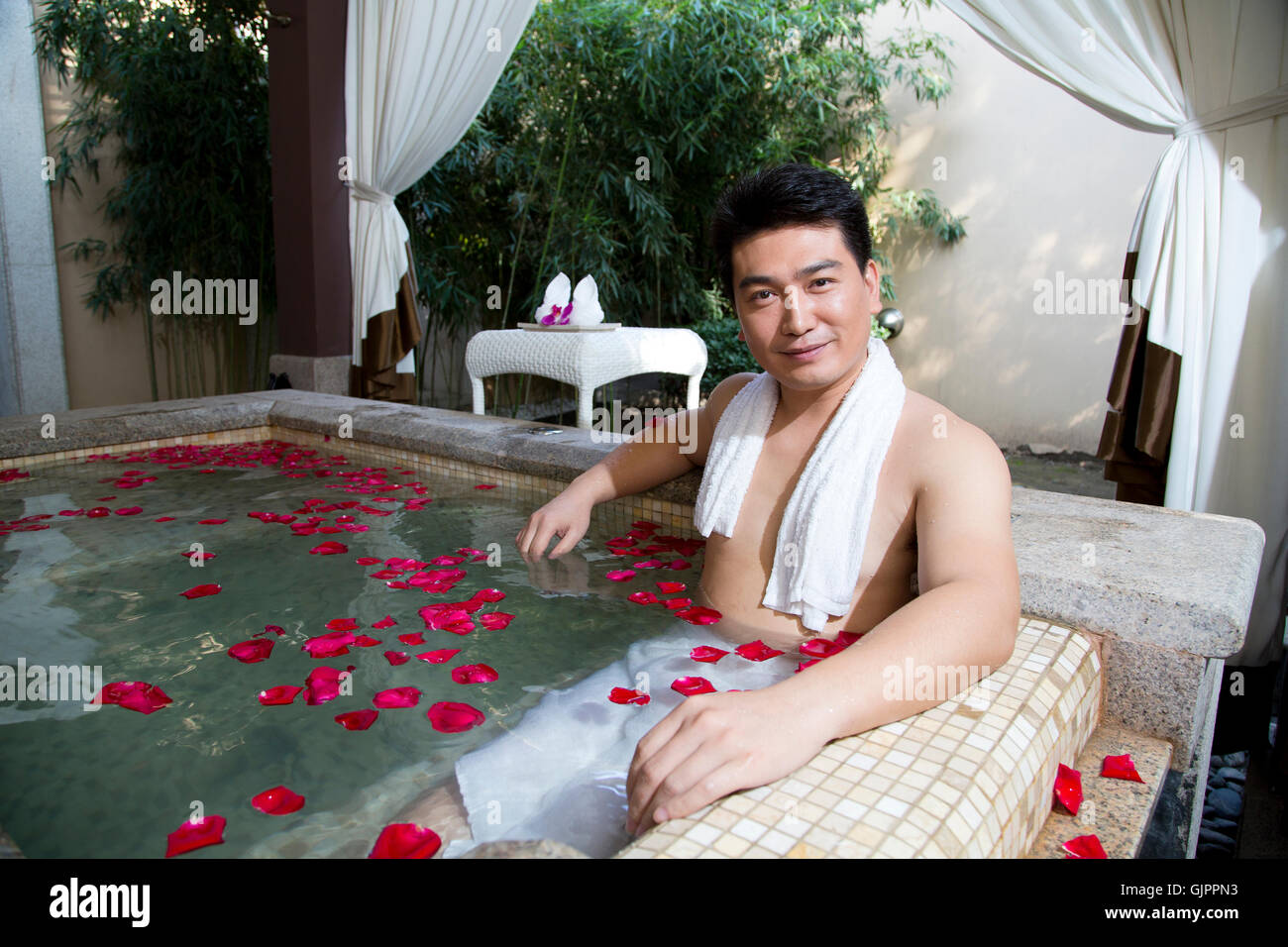 Middle-aged men hot springs Stock Photo - Alamy