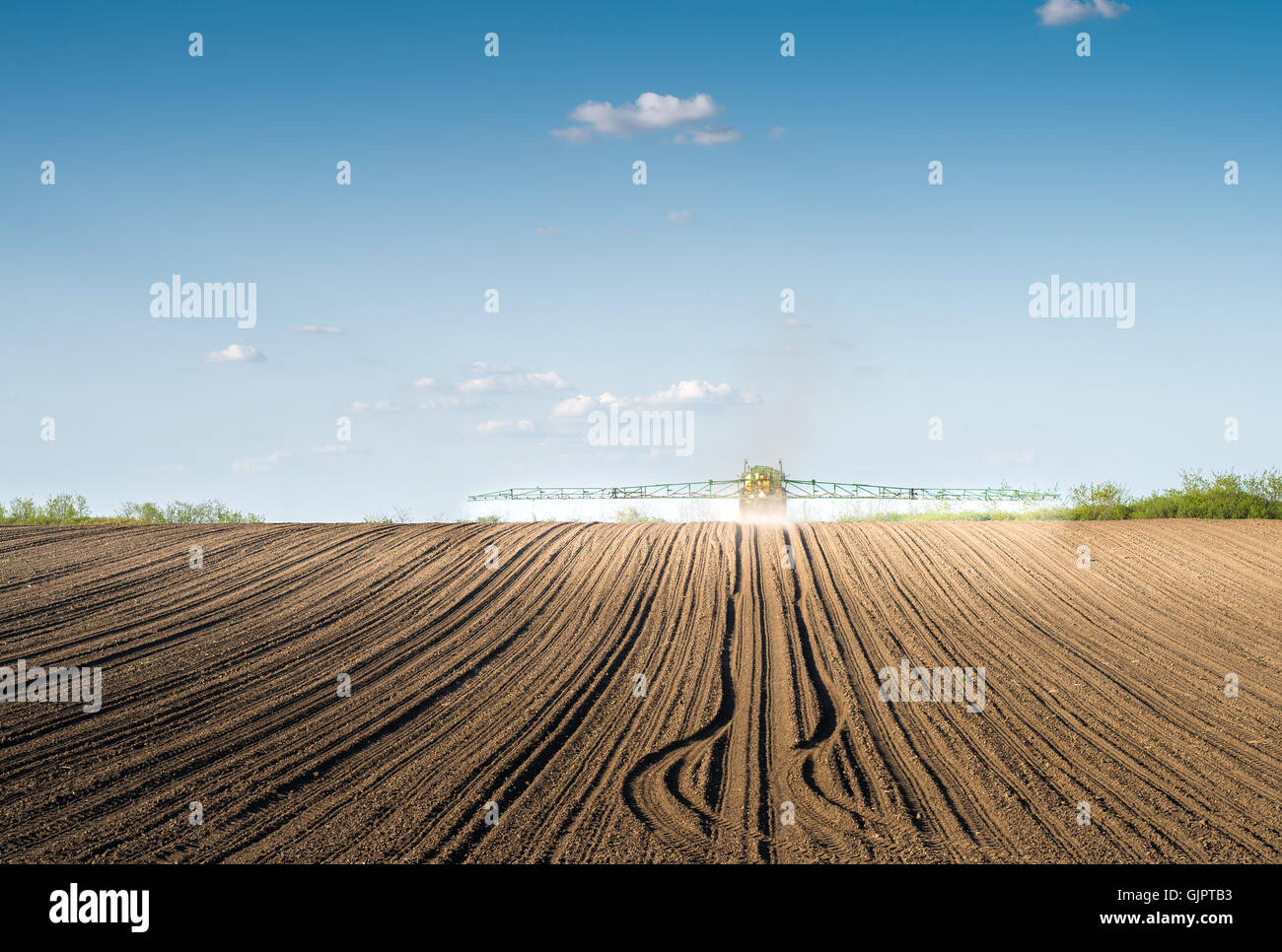 Tractor sprayer on field hi-res stock photography and images - Alamy