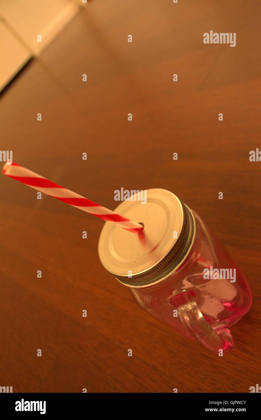 Beautiful pink jar in wooden floor with straw ready to be filled Stock ...