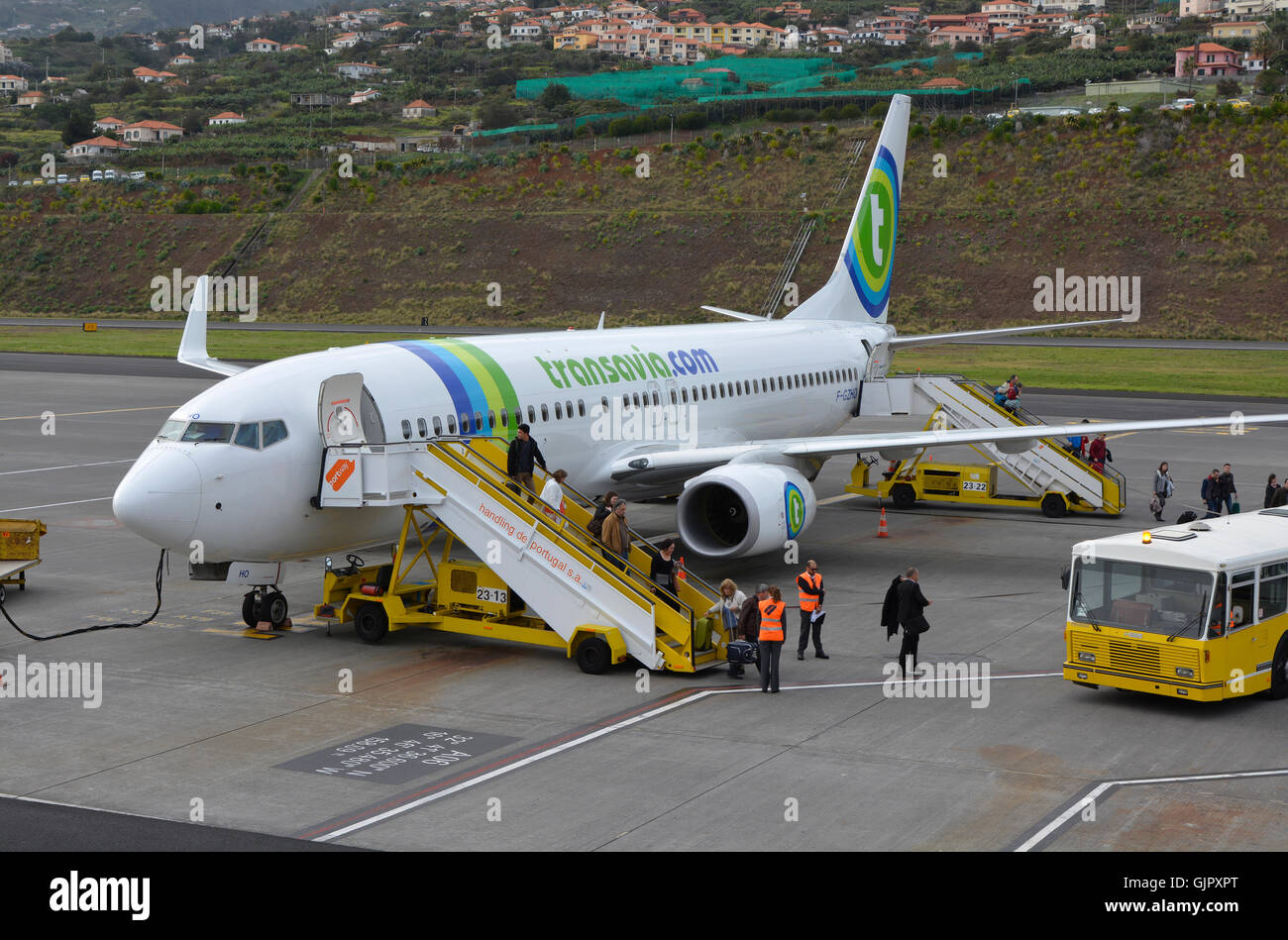 A Transavia aircraft unloading passengers at Madeira airport, Portugal ...
