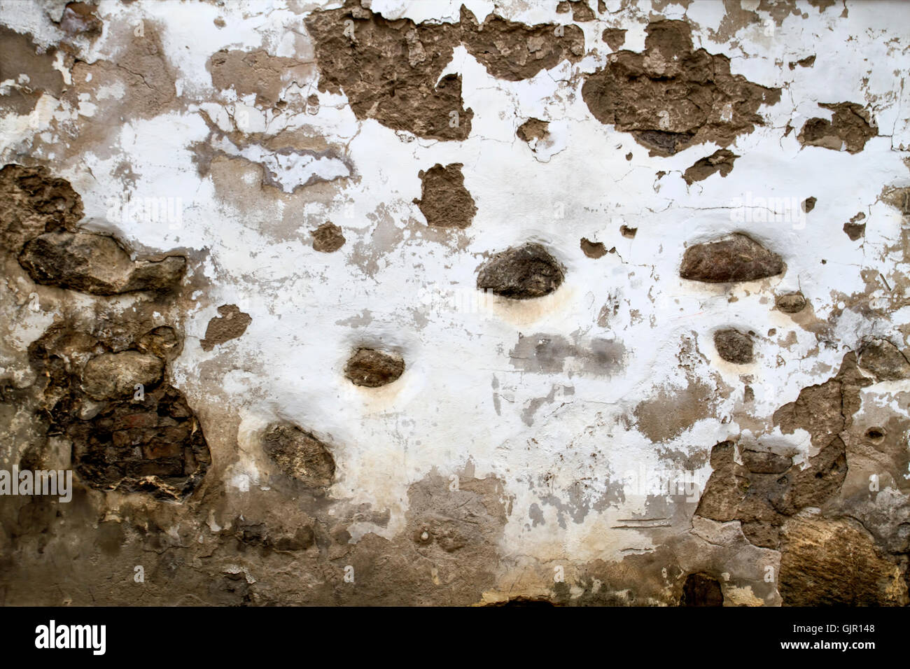 Background of old damaged stone wall texture Stock Photo - Alamy