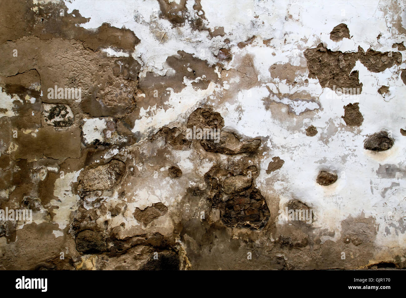 Background of old damaged stone wall texture Stock Photo - Alamy