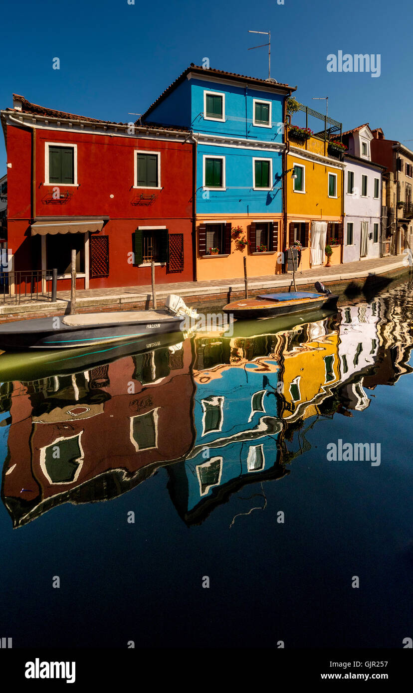 The traditional colourful painted canalside terrace houses on the ...