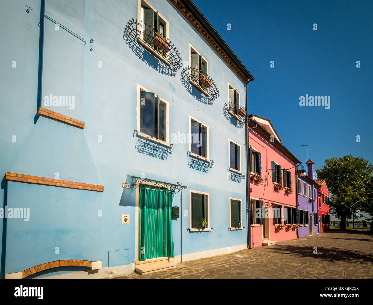 The traditional colourful painted buildings of the island of Burano ...