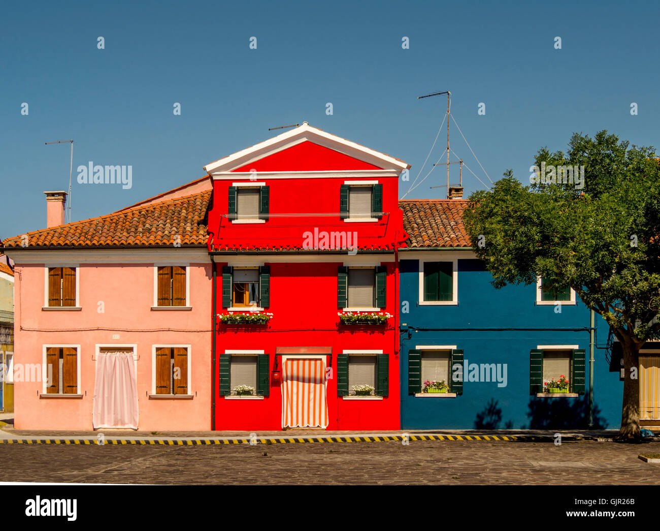 The traditional colourful painted buildings of the island of Burano ...