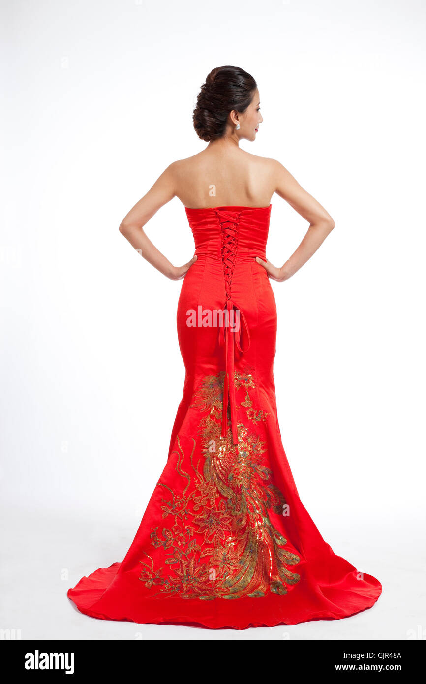 Studio shot Young woman dressed in traditional Chinese costumes back ...