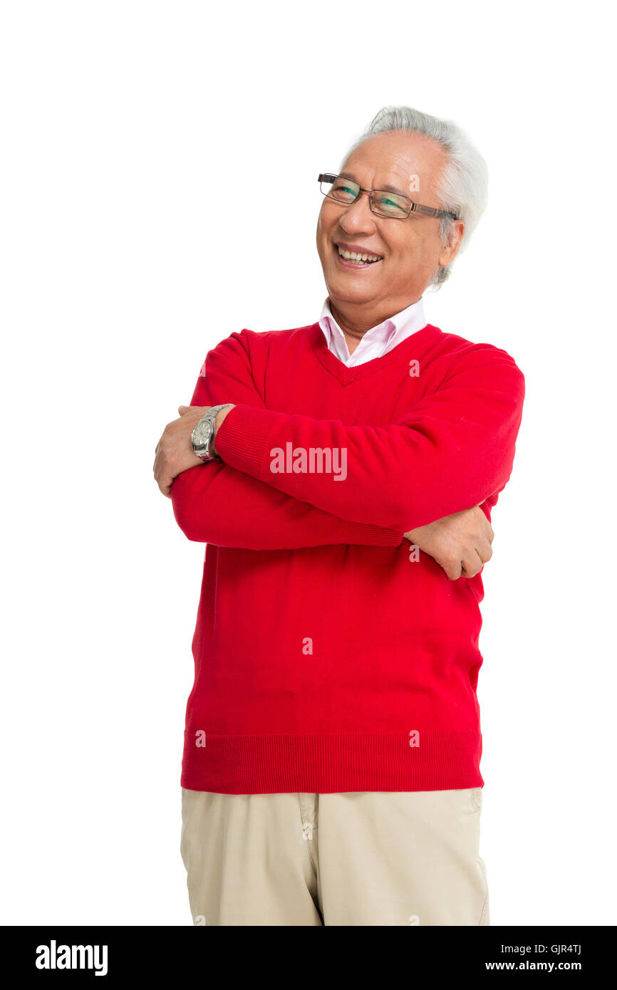 Studio shot of an old man holding shoulder Stock Photo - Alamy