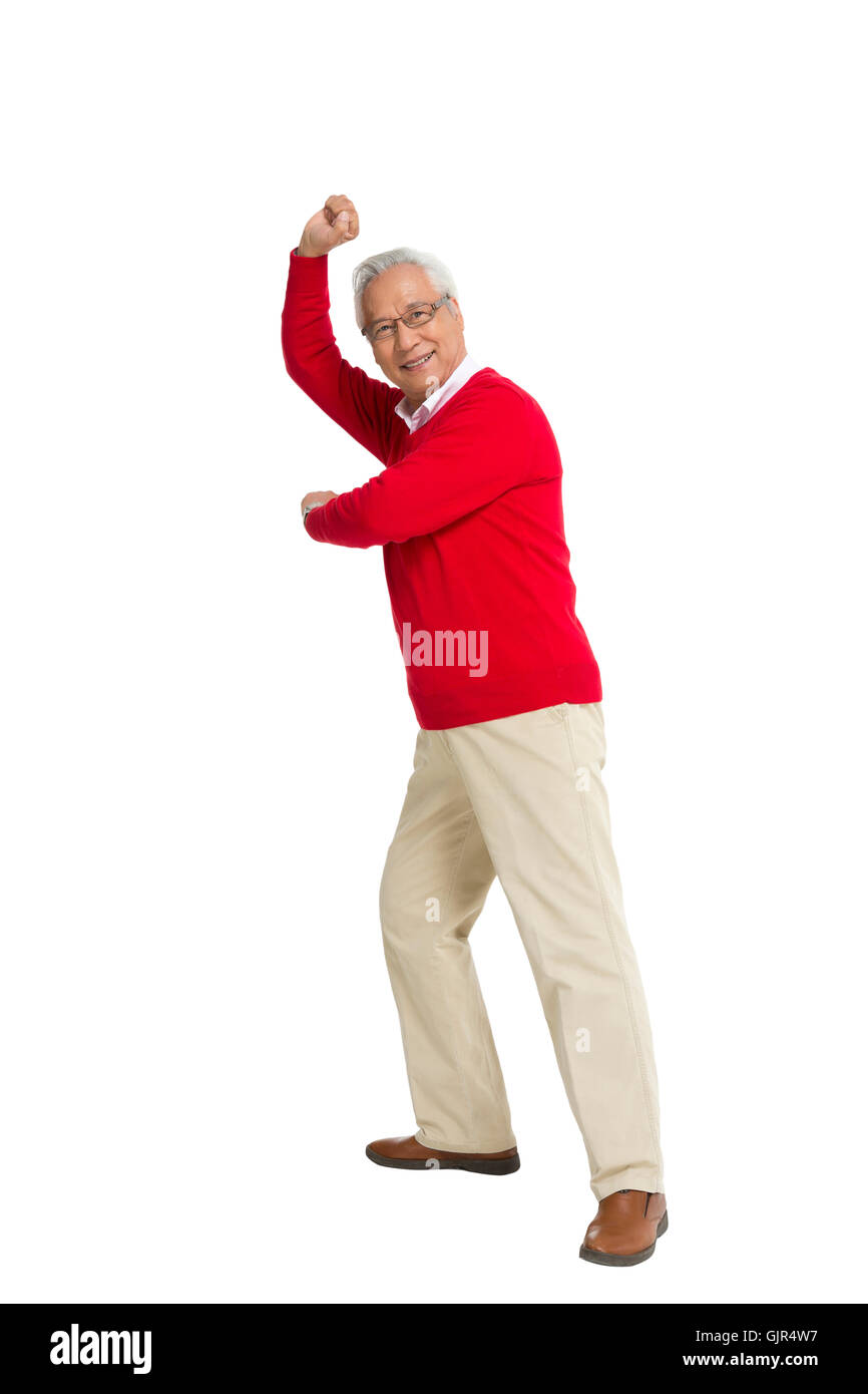 Studio shot of an old man sport Stock Photo - Alamy