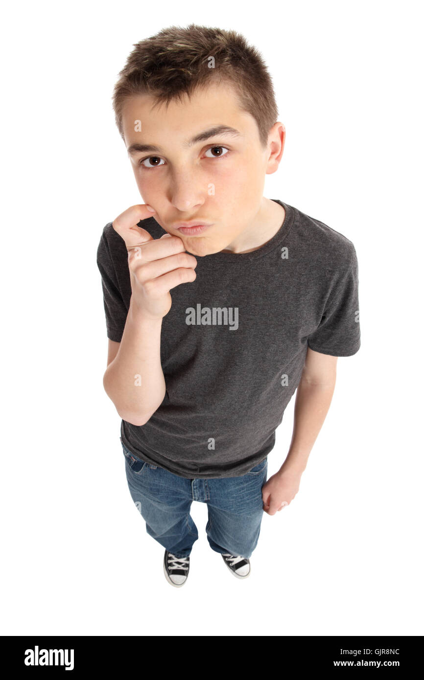 Boy thinking or pondering Stock Photo - Alamy