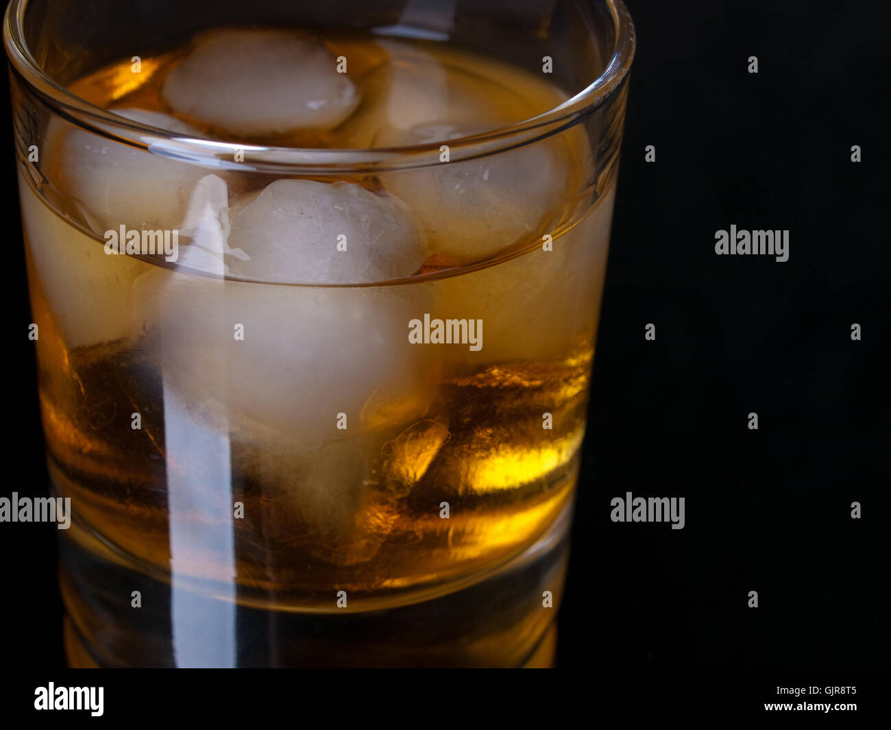 Whiskey on the rocks Stock Photo - Alamy