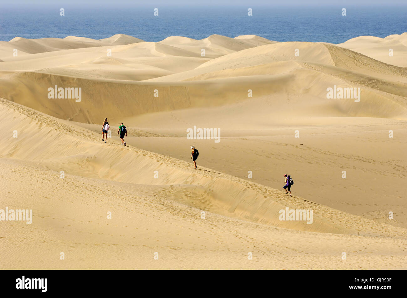 People in the desert Stock Photo - Alamy