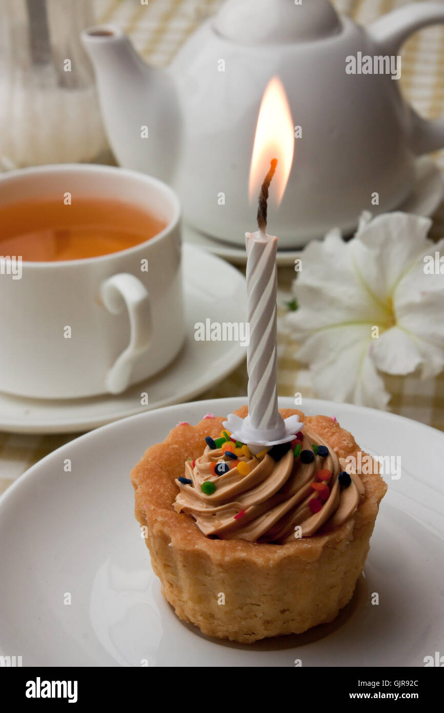 cake with a candle Stock Photo - Alamy