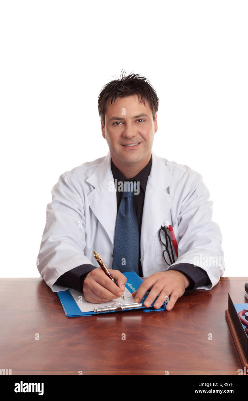 Doctor sitting at desk Stock Photo - Alamy