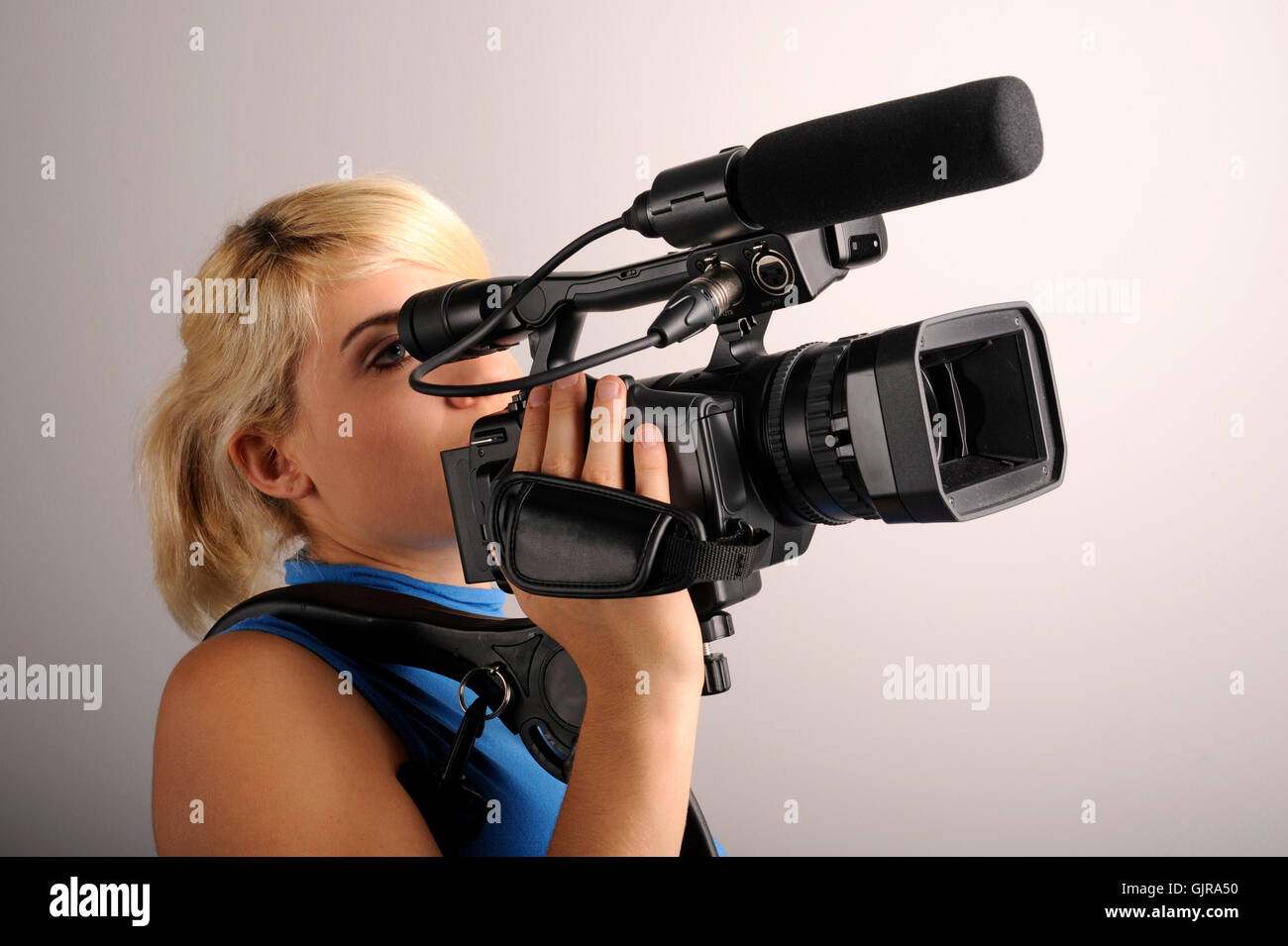 young woman video camera Stock Photo - Alamy