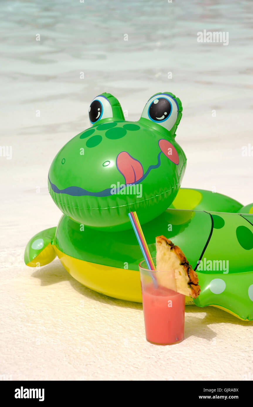 Frog and drink Stock Photo - Alamy