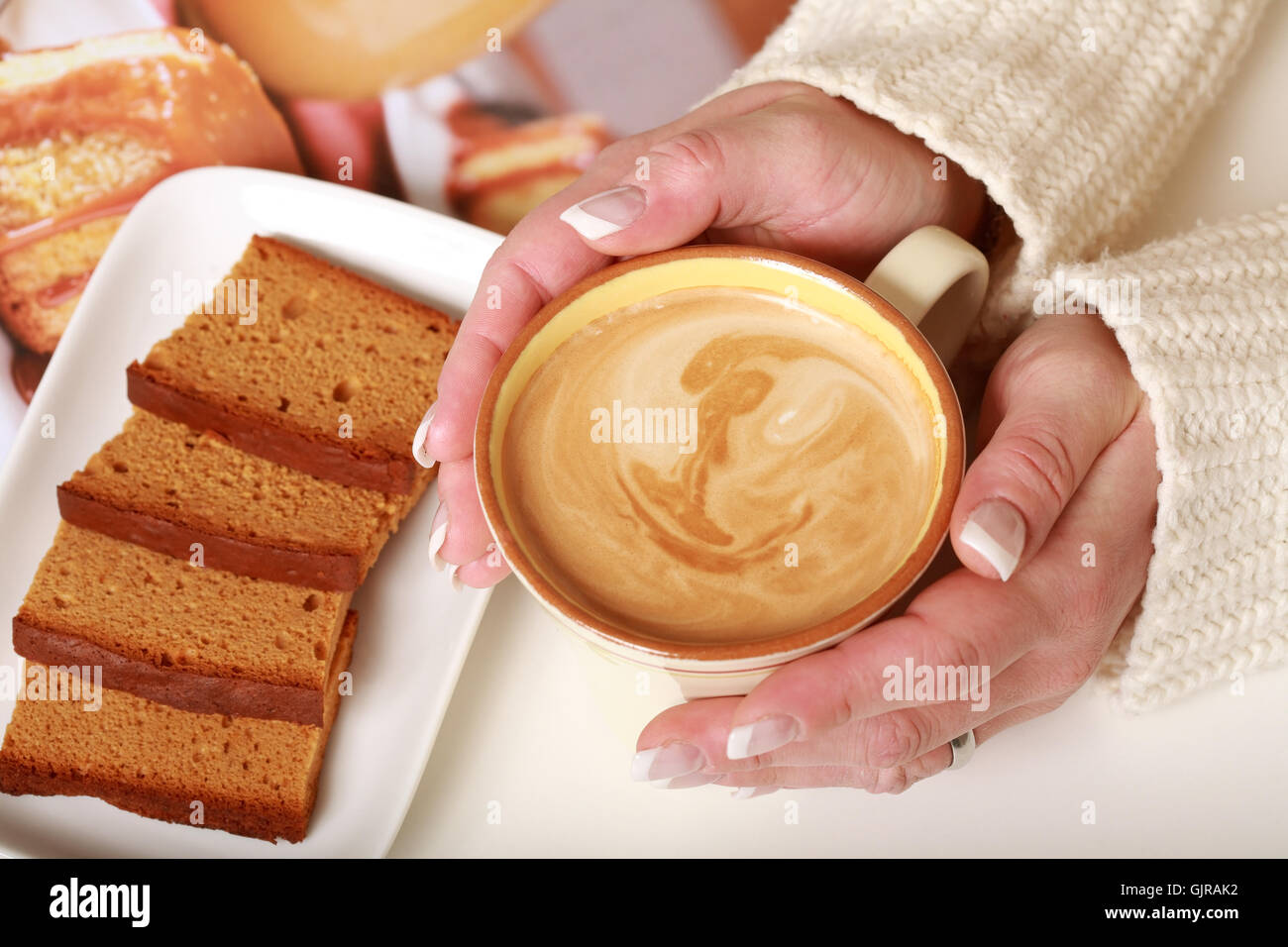 hand refreshment cake Stock Photo - Alamy
