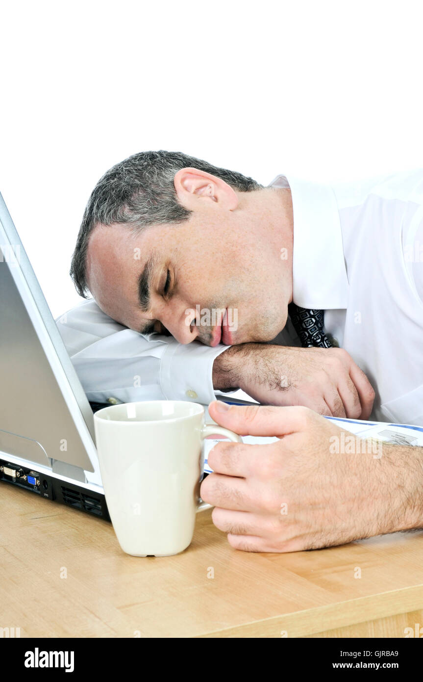 desk isolated tired Stock Photo - Alamy