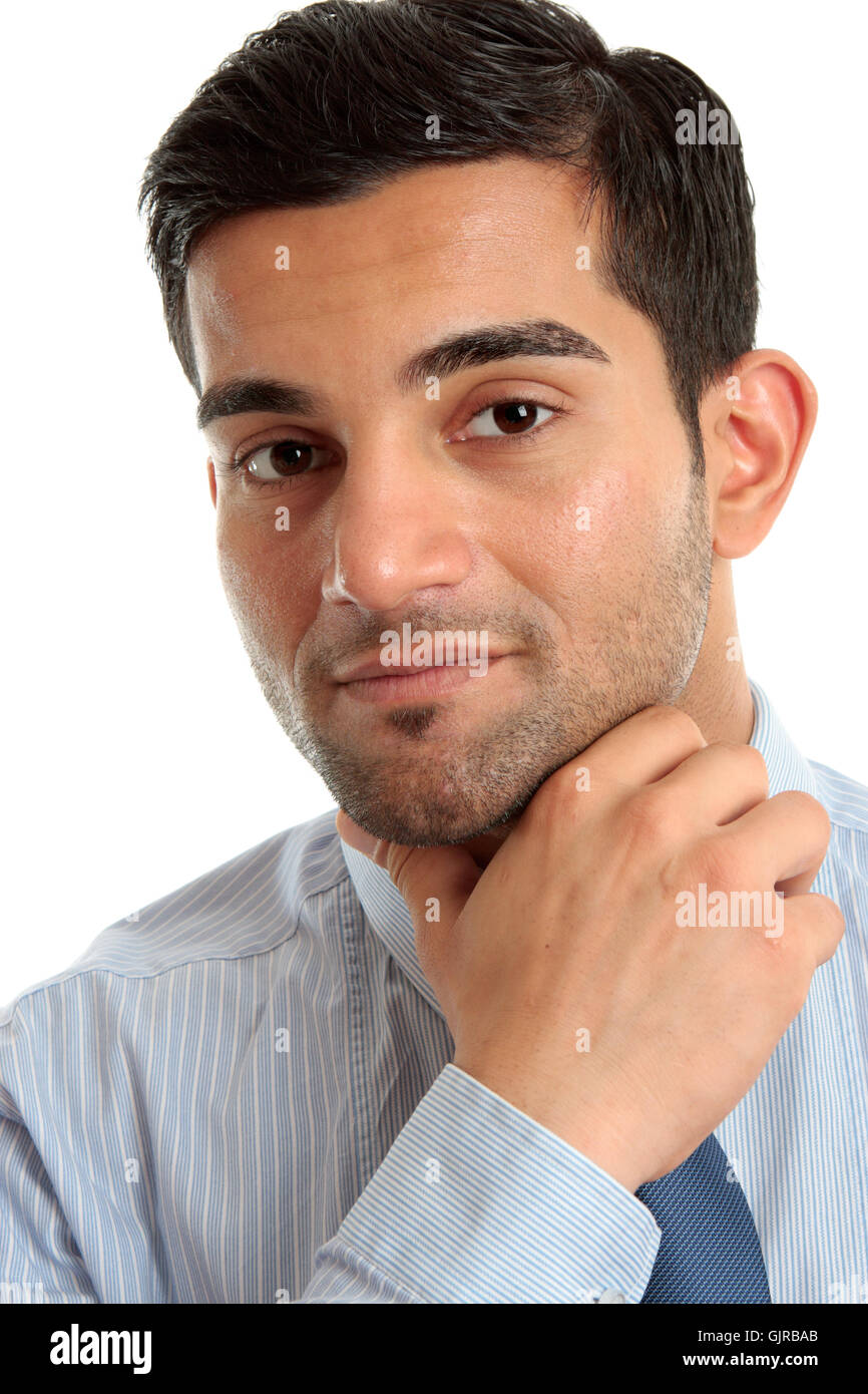 Confident businessman thinking Stock Photo - Alamy