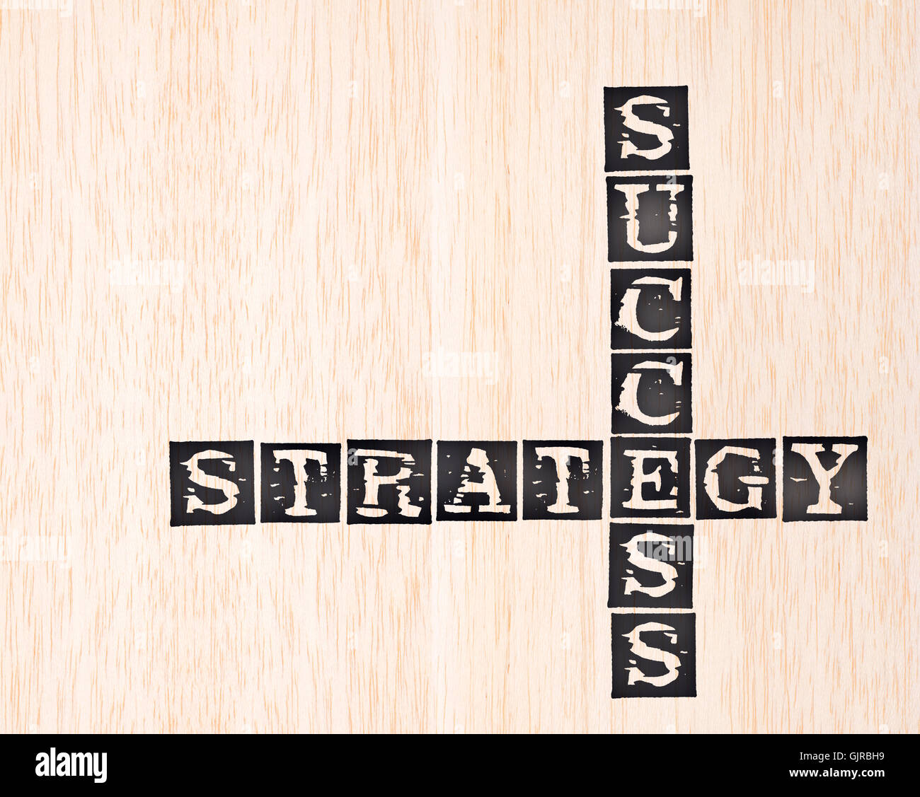 Success and strategy word stamped on wooden background Stock Photo - Alamy